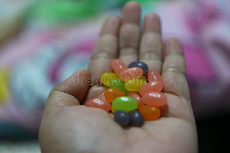 Colorful Pastel Candy in One& X27;s Hand Stock Photo - Image of hand ...