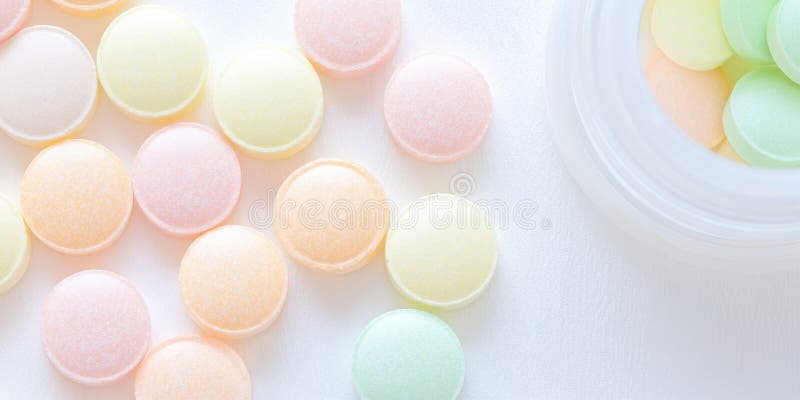 Colorful Pastel Candy Tablets on White Surface with Open Stock ...