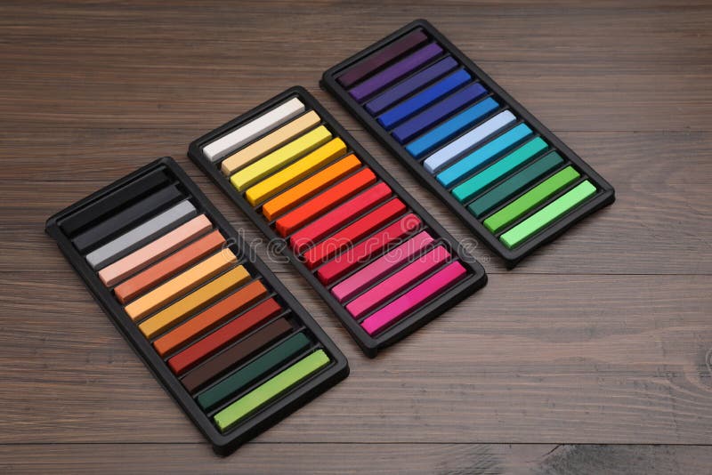 Colorful Pastels in Trays on Wooden Table. Drawing Materials Stock ...