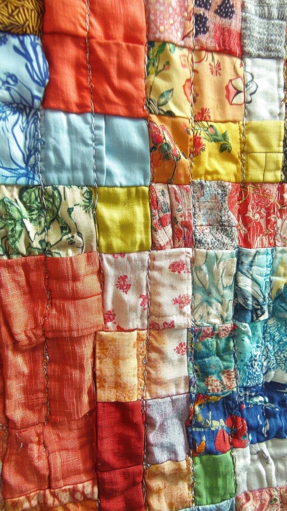 Colorful Patchwork Quilt Showcases Intricate Patterns and Textures in ...