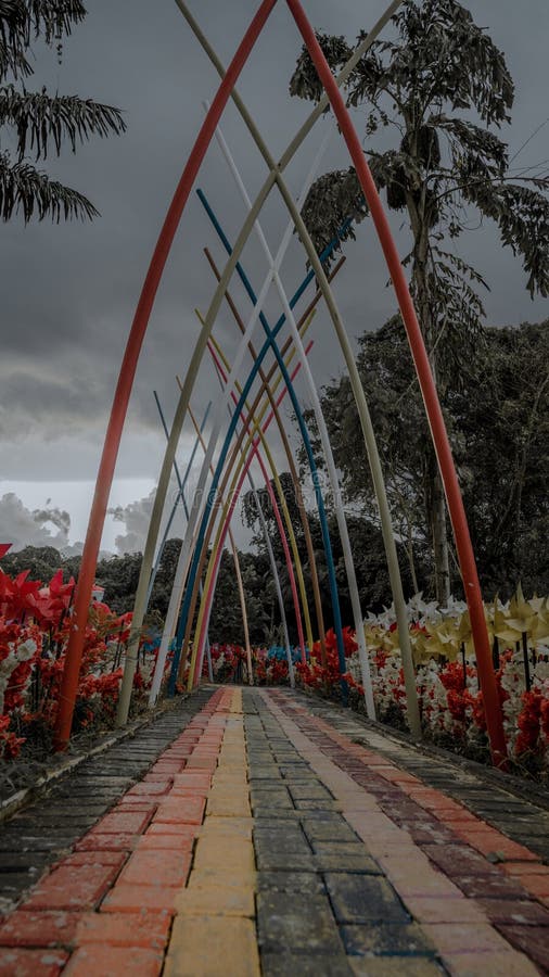 Colorful Pathway with Rainbow Bricks and Arches Stock Image - Image of ...