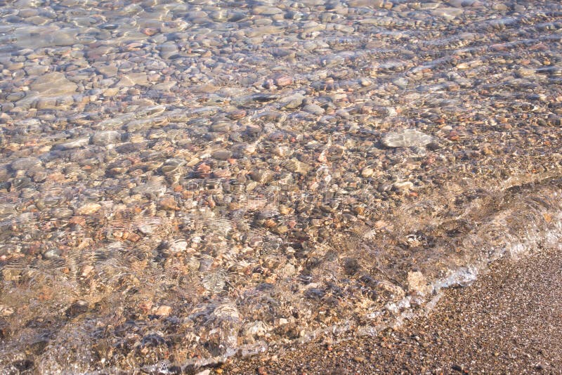 Colorful Pebbles on Beach in Water Stock Photo - Image of rocks, summer ...