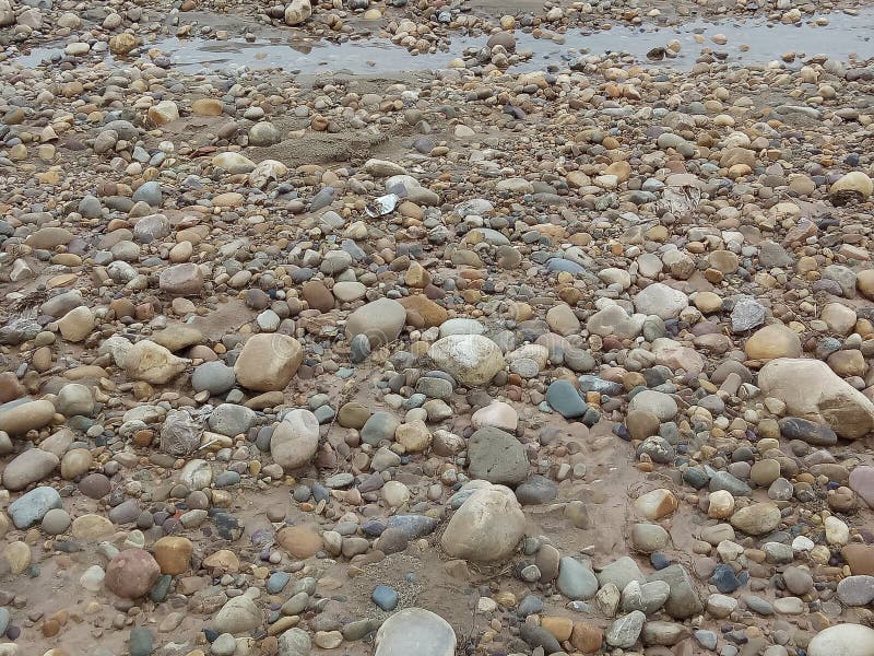 Colorful pebbles stone stock photo. Image of bedrock - 257752966