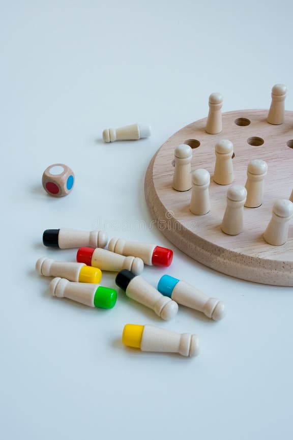 Colorful Peg Board Game with Dice on White Surface Stock Photo - Image ...