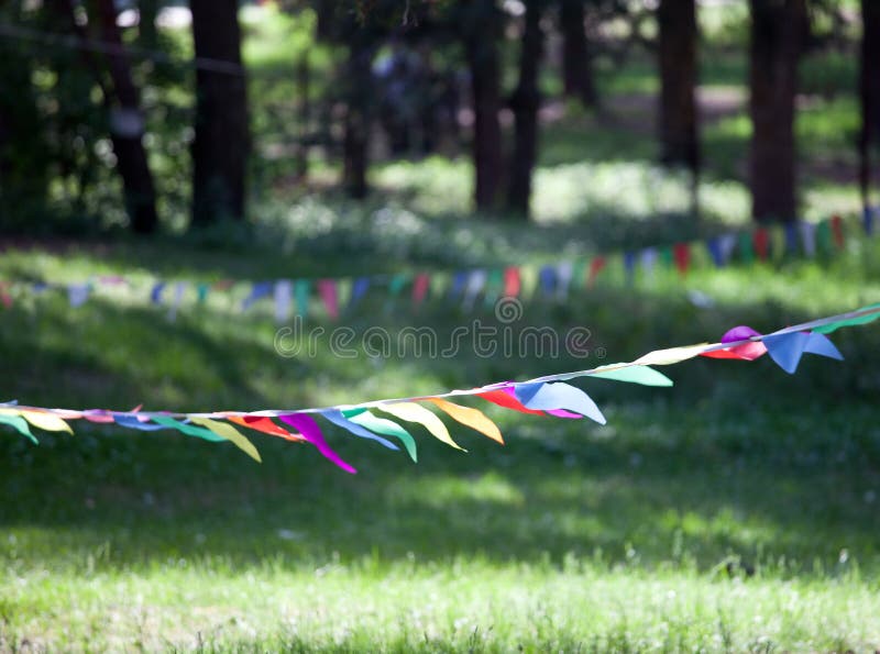 Colorful Pennant Garland in the Wind Stock Image - Image of flutter ...