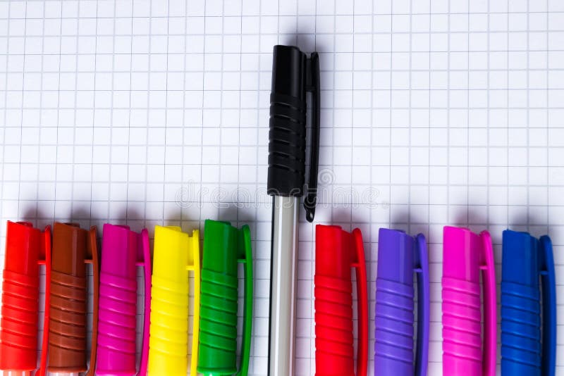 Colorful Pens in a Row on Sheet of Squared Paper Stock Image - Image of ...