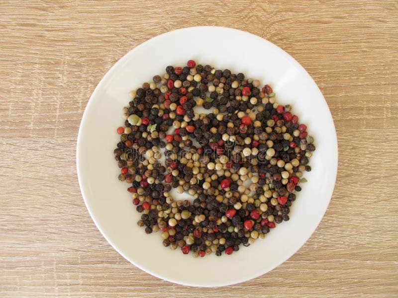 Colorful Pepper Mix on Plate Stock Image - Image of pink, white: 115880007