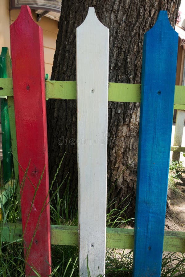 Colorful Picket Fence Painted in Red, White and Blue Stock Photo ...