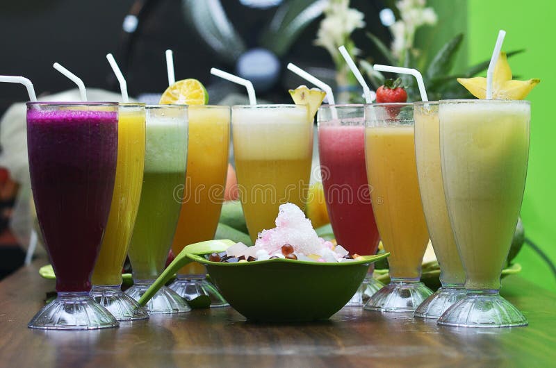 Colorful Picture of Different Smoothies on a Table Stock Photo - Image ...