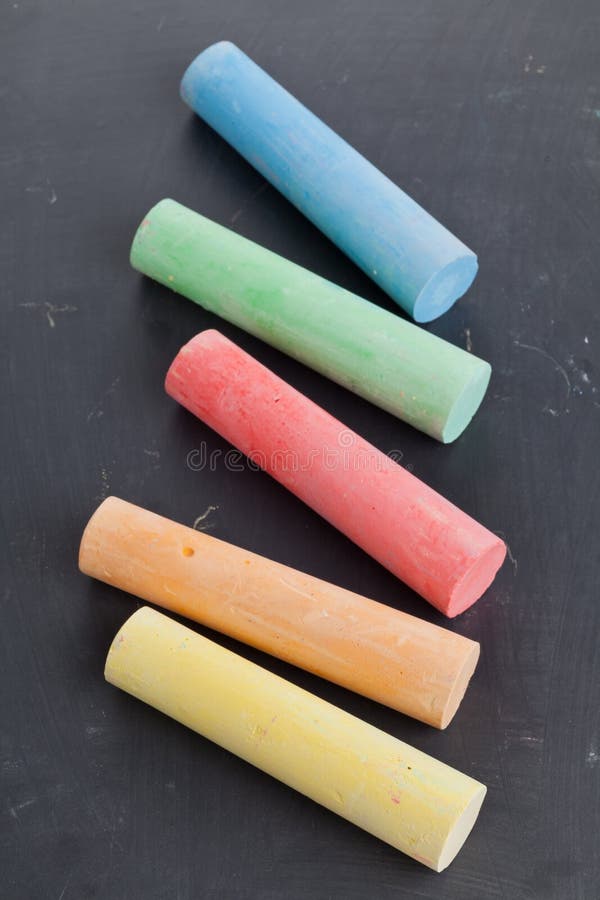 Colorful Pieces of Chalk on Blackboard Stock Image - Image of ...