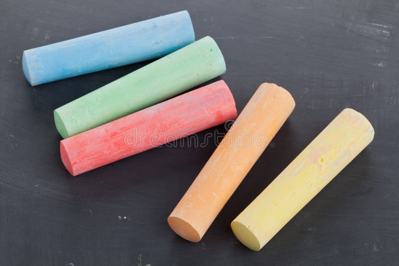 Colorful Pieces of Chalk on Blackboard Stock Photo - Image of blue ...