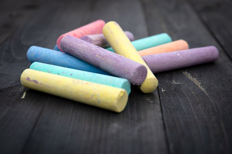 Colorful Pieces of Chalk on a Wooden Texture Background Stock Image ...