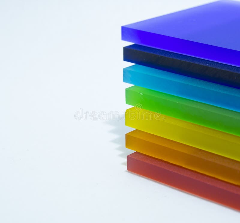Colorful Pieces of Matte Plexiglass on a Wooden Background. Stock Image ...