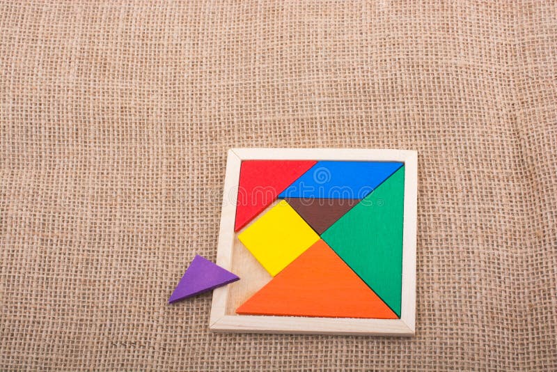 Pieces of a Square Tangram Puzzle Stock Image - Image of canvas ...