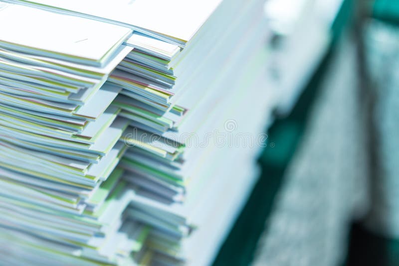 Colorful Piles of Paper Stacked on a Table Placed. Stock Photo - Image ...