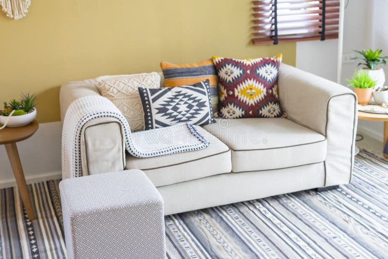 Colorful Pillow with Native American Pattern on Sofa in Living Room ...