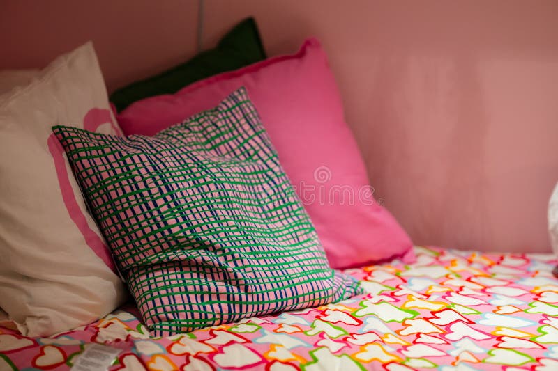 Colorful Pillows on a Bed.. Stock Photo - Image of lifestyle, interior ...