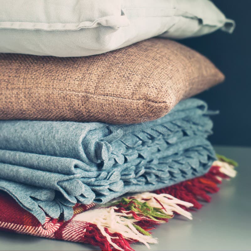 Colorful Pillows Stack on Dark Background Stock Photo - Image of ...