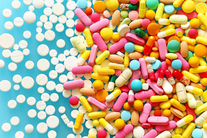 Colorful Pills on a Blue Background Stock Image - Image of pills ...