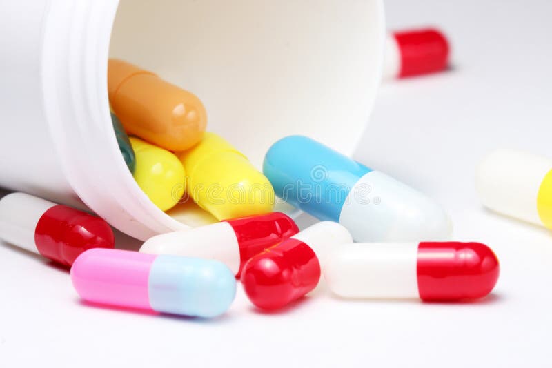 Colorful pills with can stock photo. Image of pharmacology - 6210208