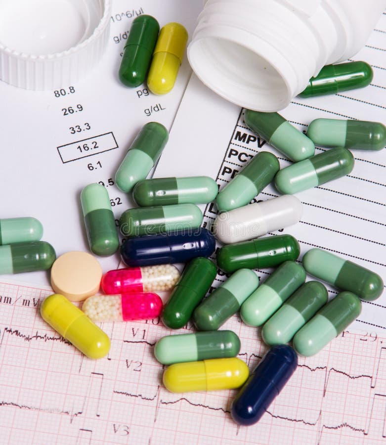 Colorful Pills and Capsules with Analysis Background Stock Image ...