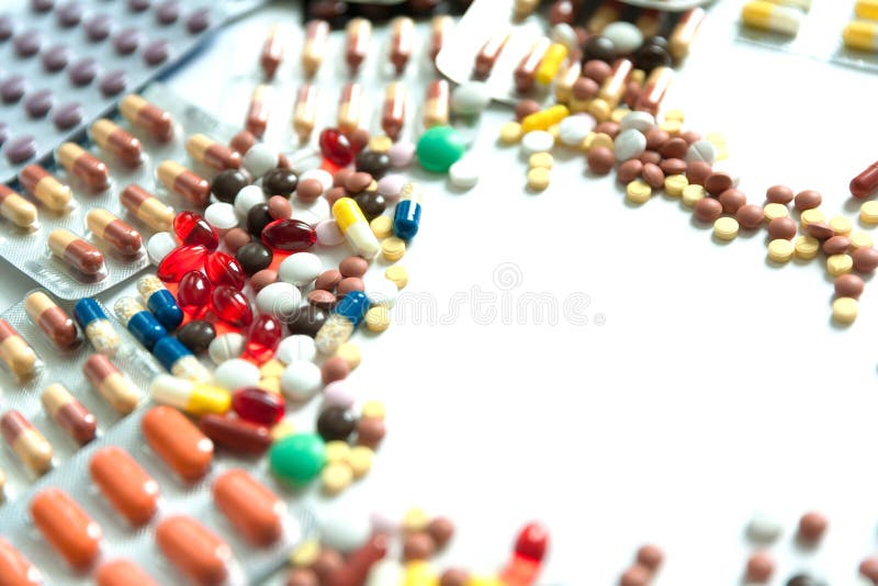 Colorful Pills and Drugs Scattered on White Background with Copy Space ...