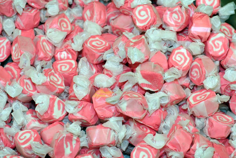 Colorful Pink and White Salt Water Taffy Stock Image - Image of candies ...