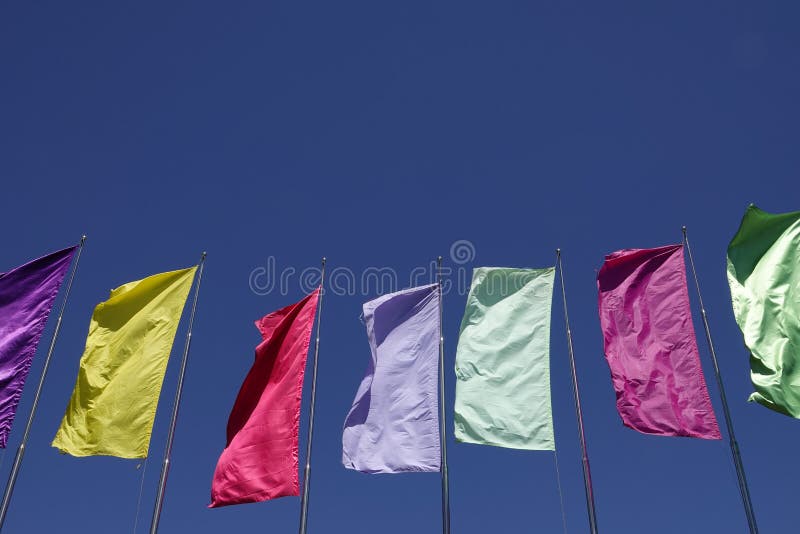 Colorful Plain Flag on Blue Sky Background Stock Image - Image of ...