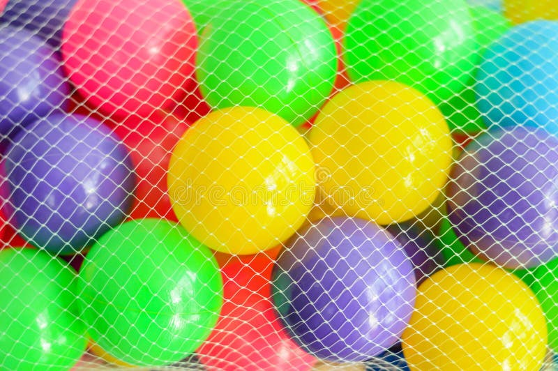 Colorful Plastic Balls in Net Package Set. Colorful Ball Background ...