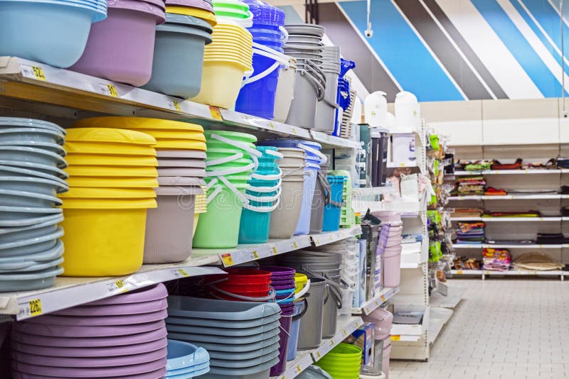 Colorful Plastic Basins and Buckets on the Counter in a Supermarket ...