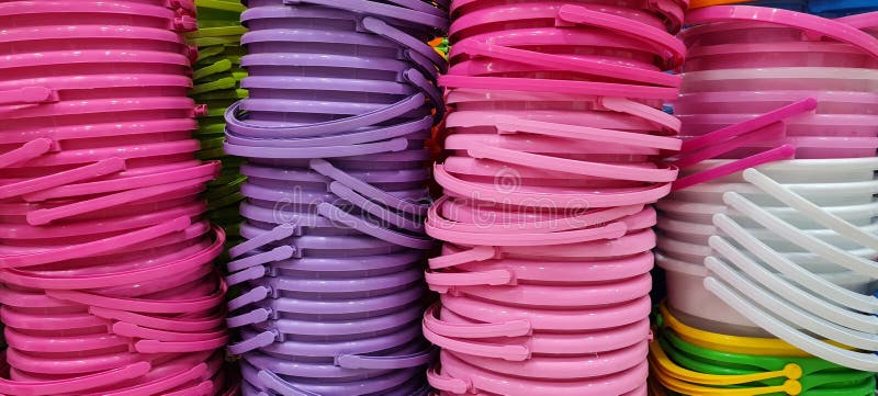 Colorful Plastic Buckets on Sale in the Supermarket Stock Photo - Image ...