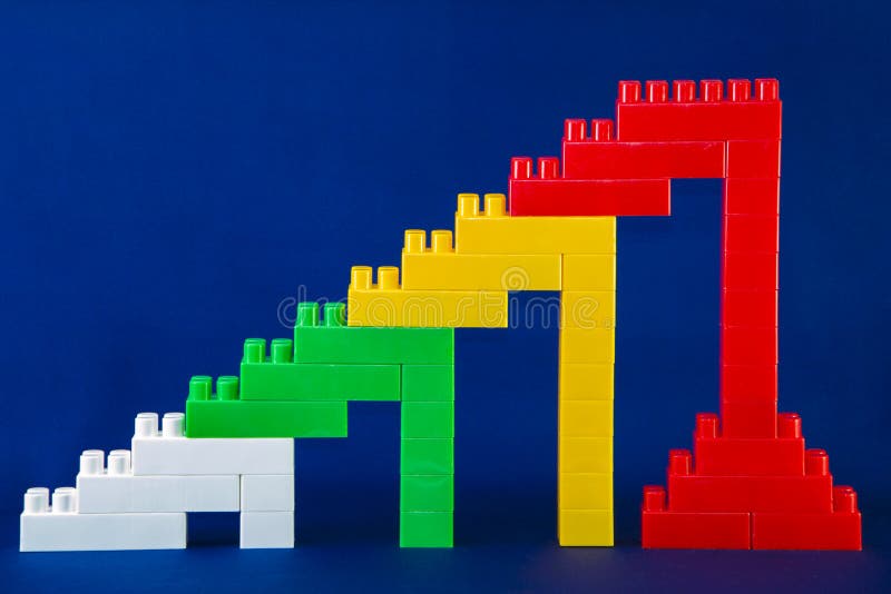 Colorful Plastic Building Bricks on Blue Background Stock Photo - Image ...