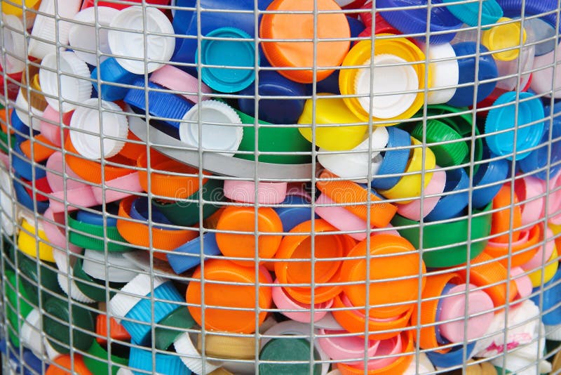 Colorful Plastic Caps Collected in a Recycle Container Stock Image ...