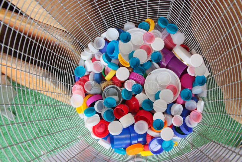 Colorful Plastic Caps Collected in a Recycle Container Stock Photo ...