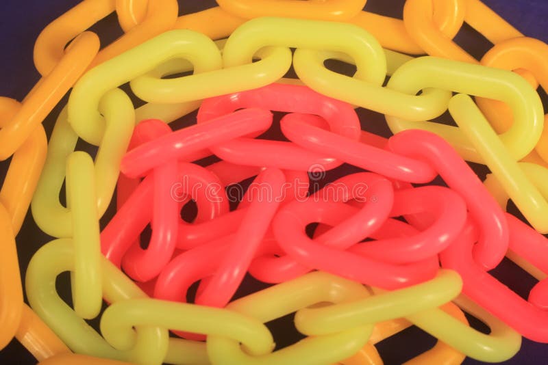 Colorful Plastic Chains on a Blue Background Stock Image - Image of ...