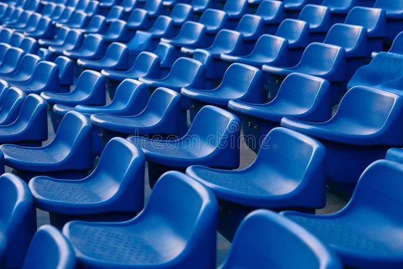 Colorful Plastic Chairs in a Stadium. Background for Design Stock ...
