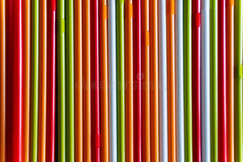 Colorful Plastic Cocktail Tubes Over Blue Background. Abstract Colorful ...