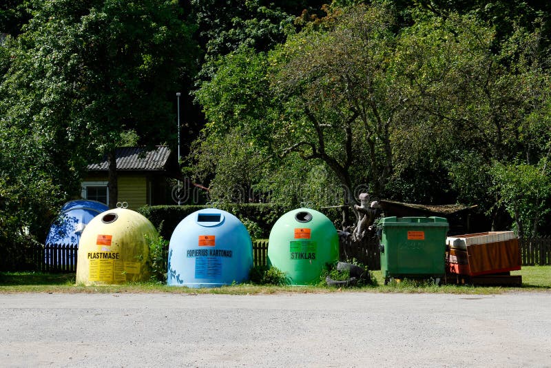 Colorful Plastic Containers in a Row for Separate Garbage Collection ...