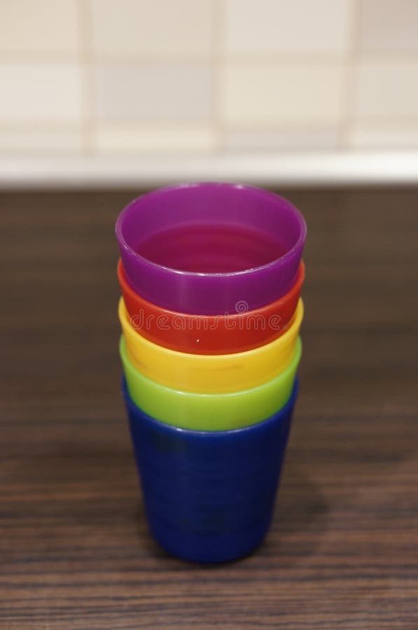 Colorful plastic cups stock photo. Image of yellow, empty - 97426506