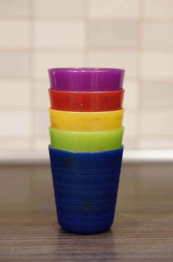 Colorful plastic cups stock photo. Image of plastic, wooden - 97426890