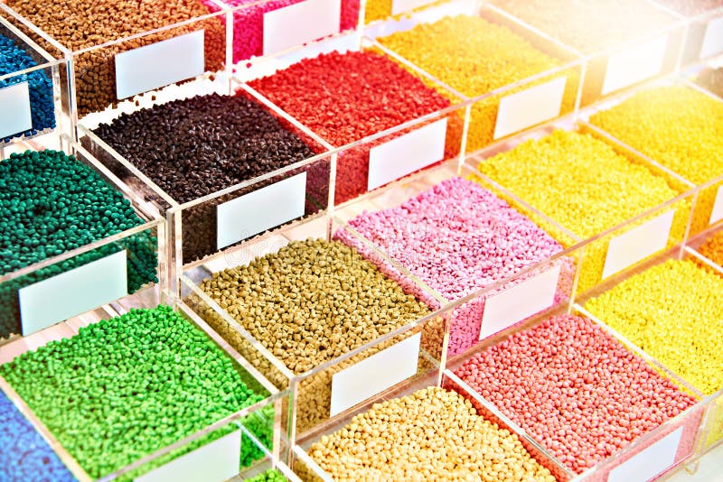 Colorful Plastic Granular Polymer Stock Photo - Image of orange, pink ...