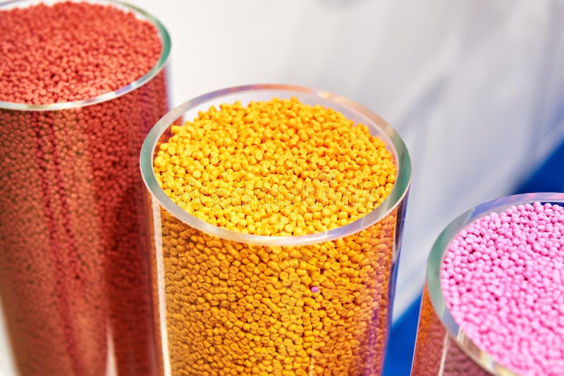 Colorful Plastic Granular Polymer Stock Photo - Image of orange, pink ...