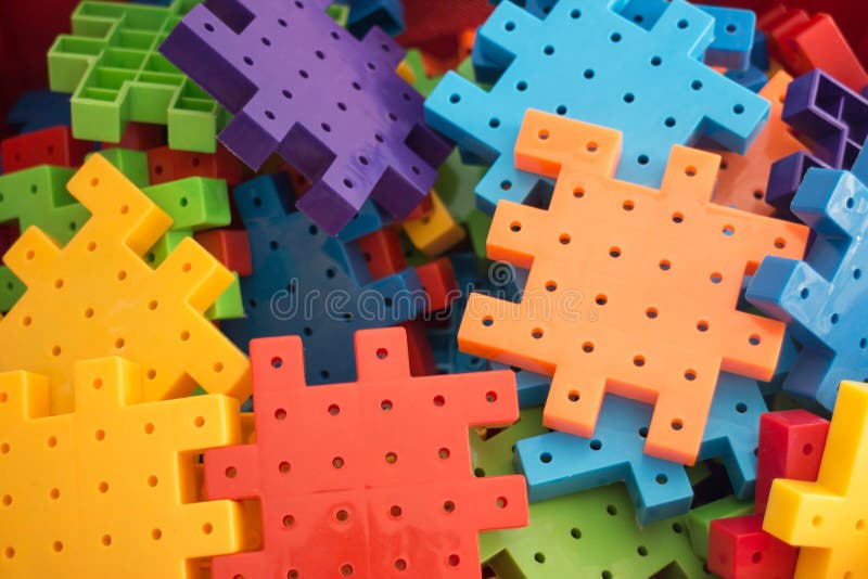 Colorful plastic puzzle stock photo. Image of puzzle - 28675158