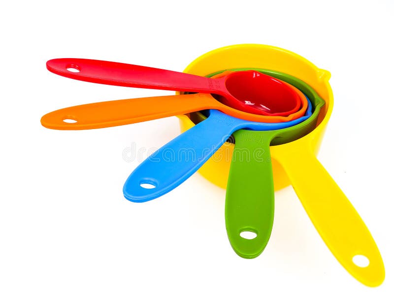 Colored measuring cups stock image. Image of green, colored - 27360407