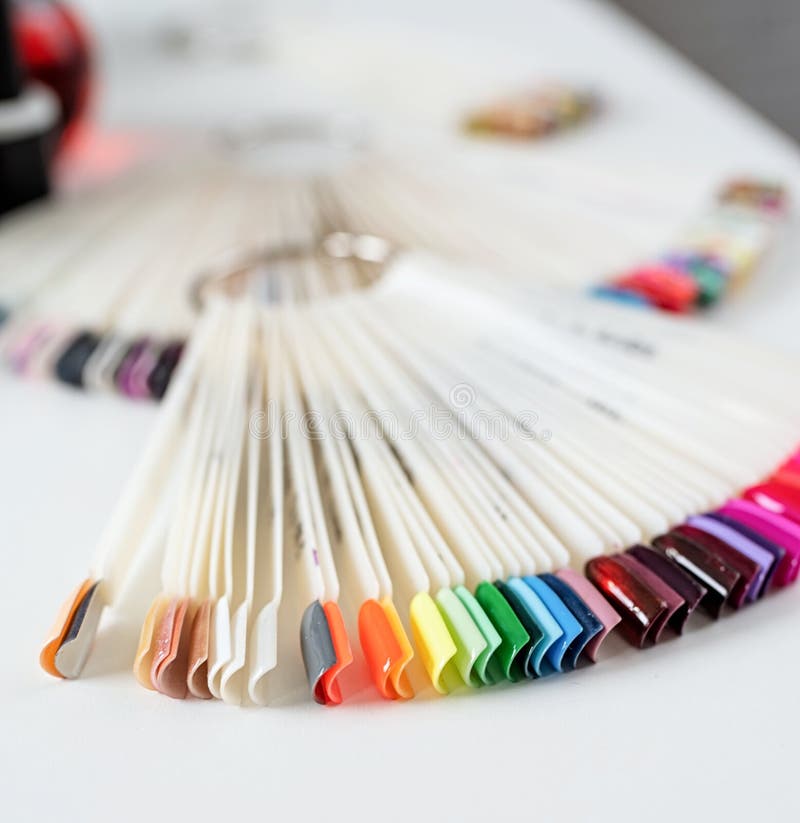 Colorful Plastic Nail Tips on the Table in Manicure Salon Stock Image ...