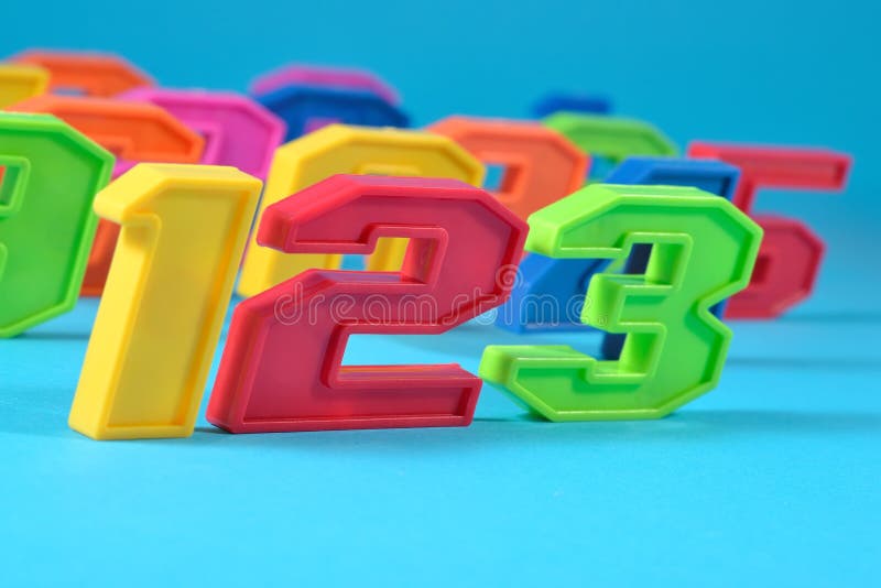 Colorful Plastic Numbers 123 on a Blue Background Stock Image - Image ...