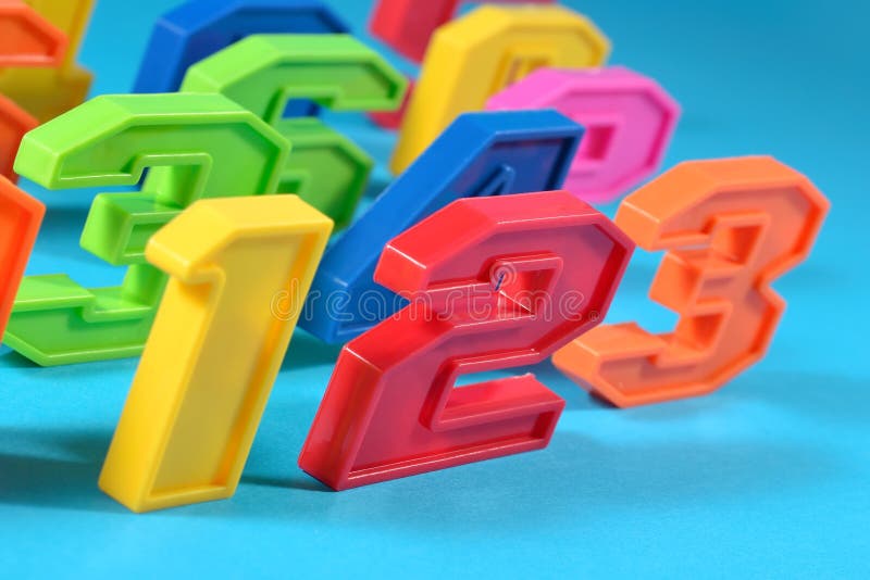 Colorful Plastic Numbers 123 on a Blue Background Stock Image - Image ...