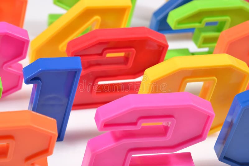 Colorful Plastic Numbers Close Up on a White Stock Image - Image of ...