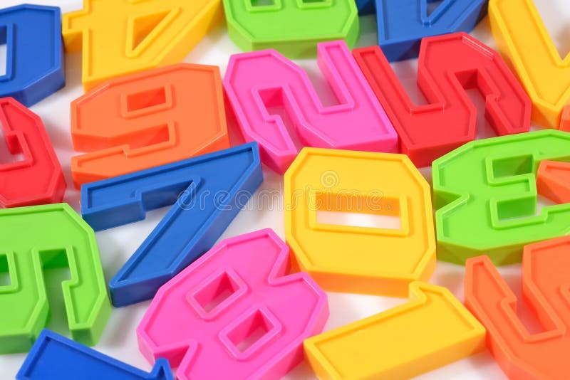 Colorful Plastic Numbers Close Up on a White Stock Image - Image of ...