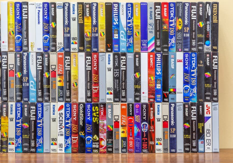 Colorful Plastic and Paper Cases with VHS Videotapes Editorial Photo ...